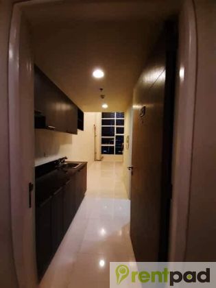 High Ceiling Bare Studio Unit with Nice View of the City Located ...